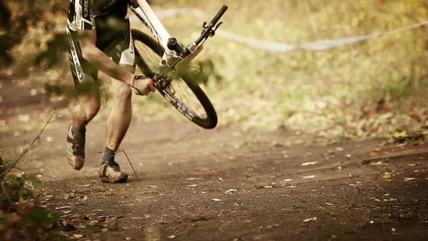 Active Biker Runs with Bicycle. Stock Footage Video (100% Royalty-free ...