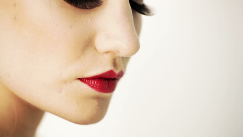 Fashion Model Striking A Pose And Looking Straight Into The Camera ...