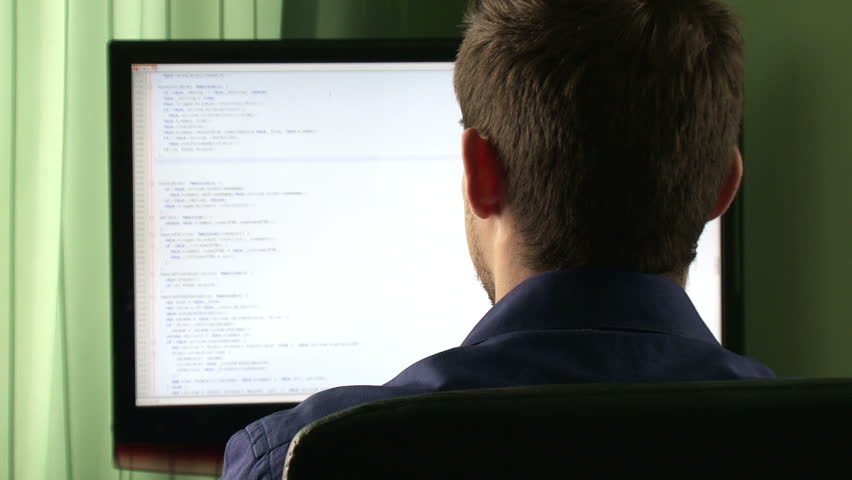 Young Computer Programmer at His Stock Footage Video (100% Royalty-free ... Young Computer Programmer at His Stock Footage Video (100% Royalty-free ...