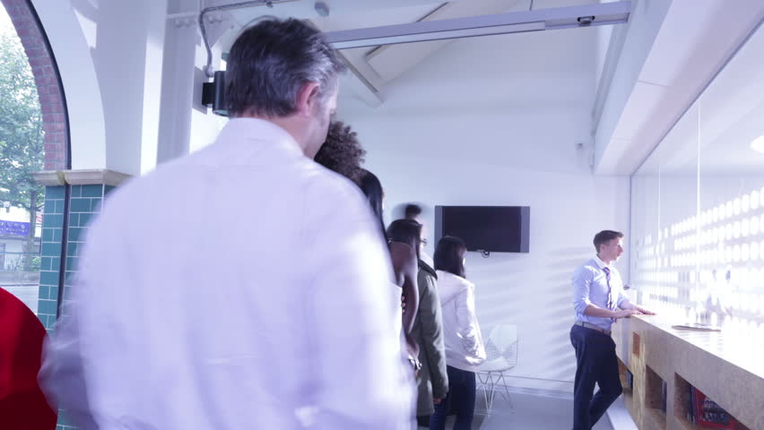 Time Lapse Of Queue Of People Waiting In Line To Be Served. Could Be A ...