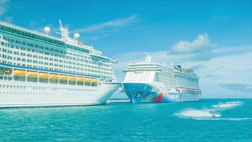 Tourists Visit The Shops And Attractions At King's Wharf On The Island ...