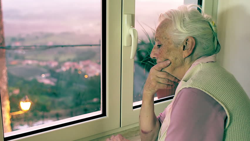 Sad And Lonely Old Woman Looking Out Window - Depressed - Sunset Stock ...