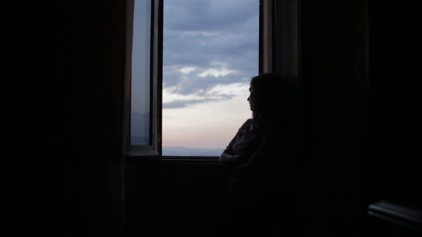 Stock video of sad and lonely woman looks out | 6165926 | Shutterstock