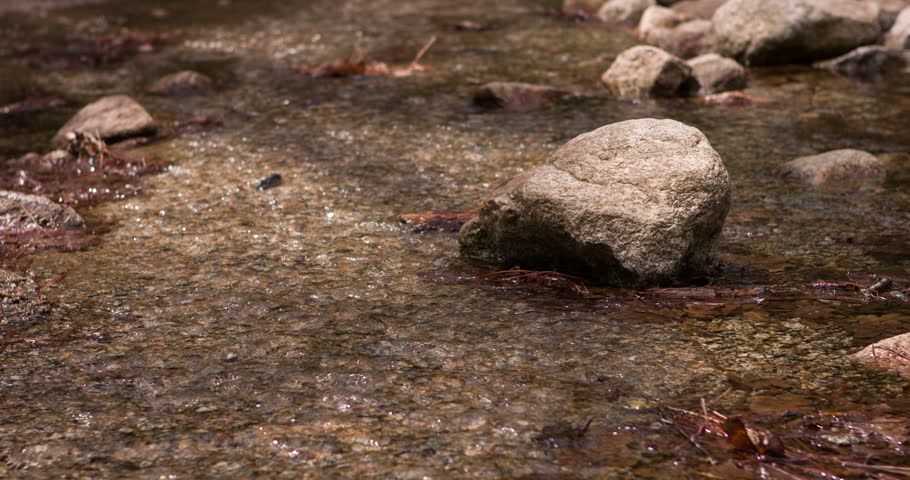 Stock video of shallow stream going through rocks 4k | 6828946 ...