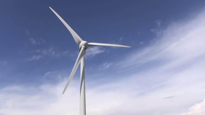 Wind Energy. Wind Energy Fan Turbine With A Rolling Clouds And Sun ...