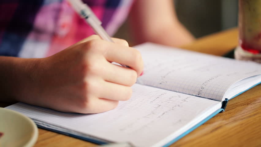 Teenage Girl Hands Writing in Video de stock (totalmente libre de ...