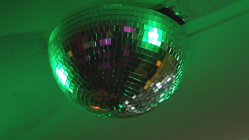 Rotating Disco Ball With Multicolor Light Effect And Reflected Spots On ...