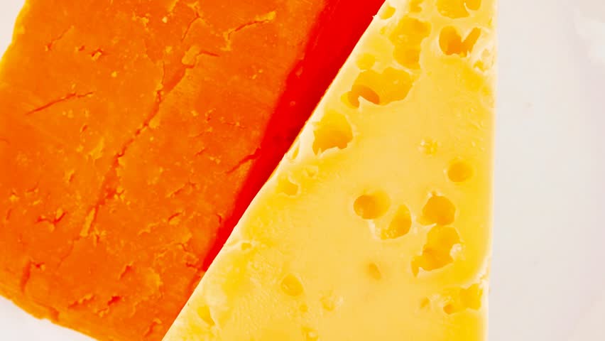 Two Pieces Of French Gourmet Cheeses Isolated Over White Background 스톡 ...