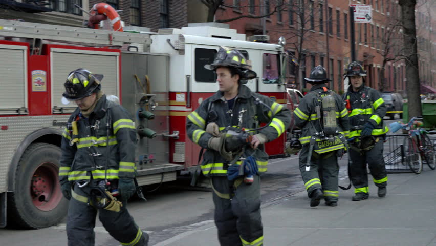 NEW YORK - FEB 15, 2015: FDNY Firefighters Talking In Group Huddle Down ...