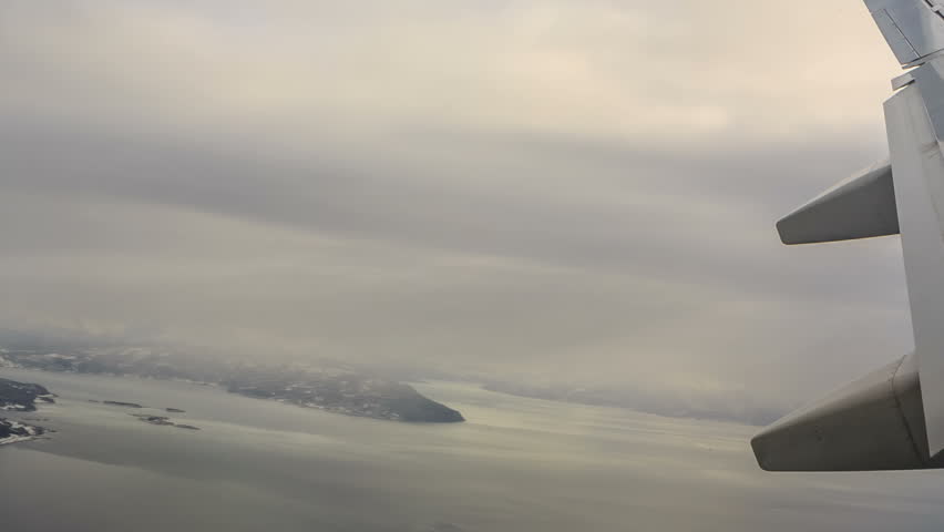 Landing Of An Aircraft On The Runway In The Fog With A View Of The Wing ...